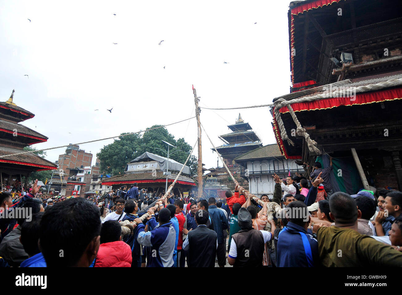 Kathmandu, Nepal. 13th Sep, 2016. Nepalese devotees pulling rope to ...