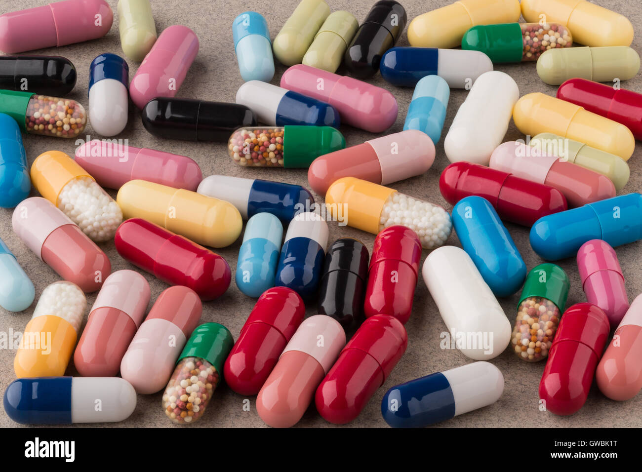 Heap of colorful drugs and pills Stock Photo - Alamy