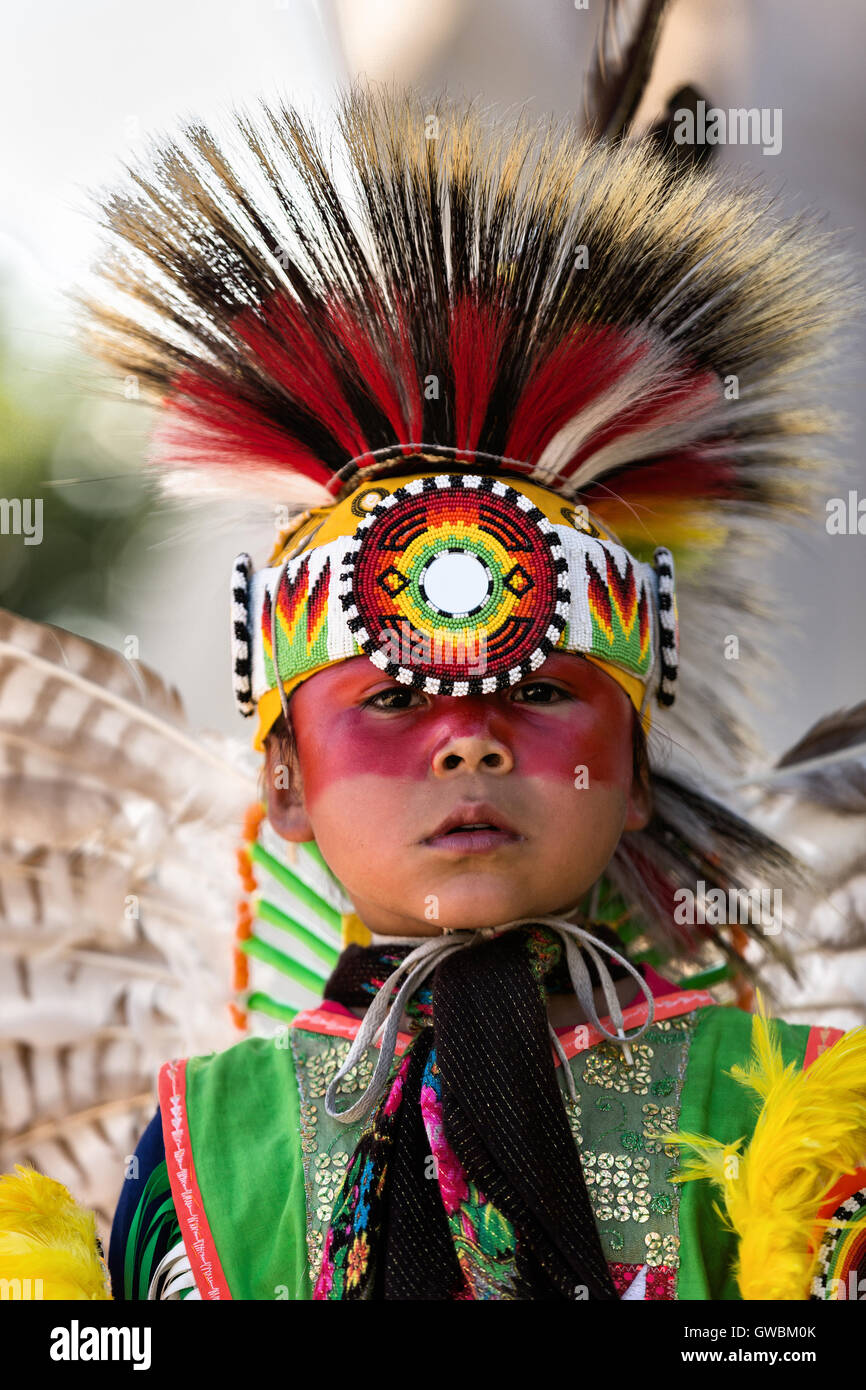 A young Native American dancer from the Arapahoe people dressed in ...
