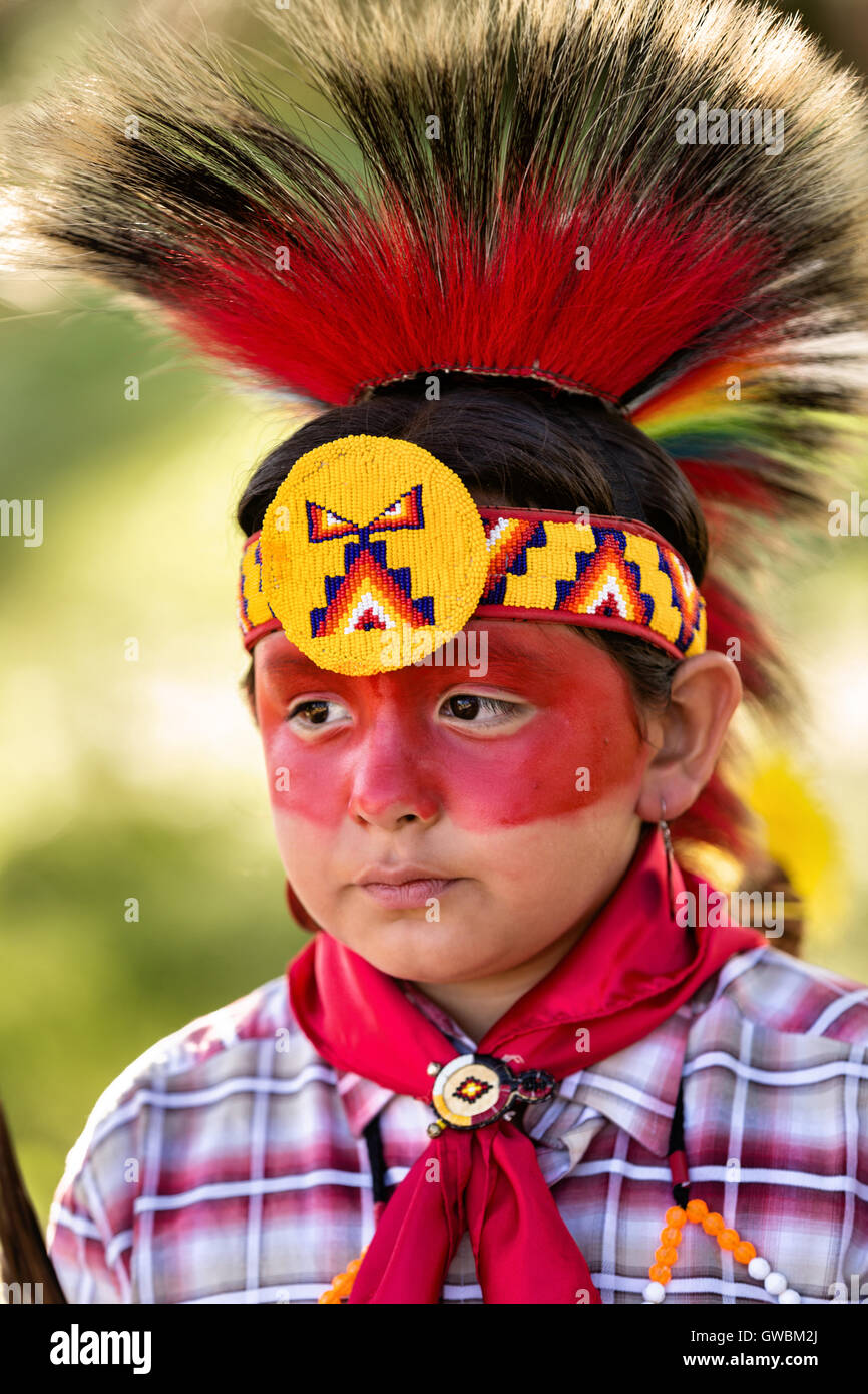 A young Native American dancer from the Arapahoe people dressed in ...