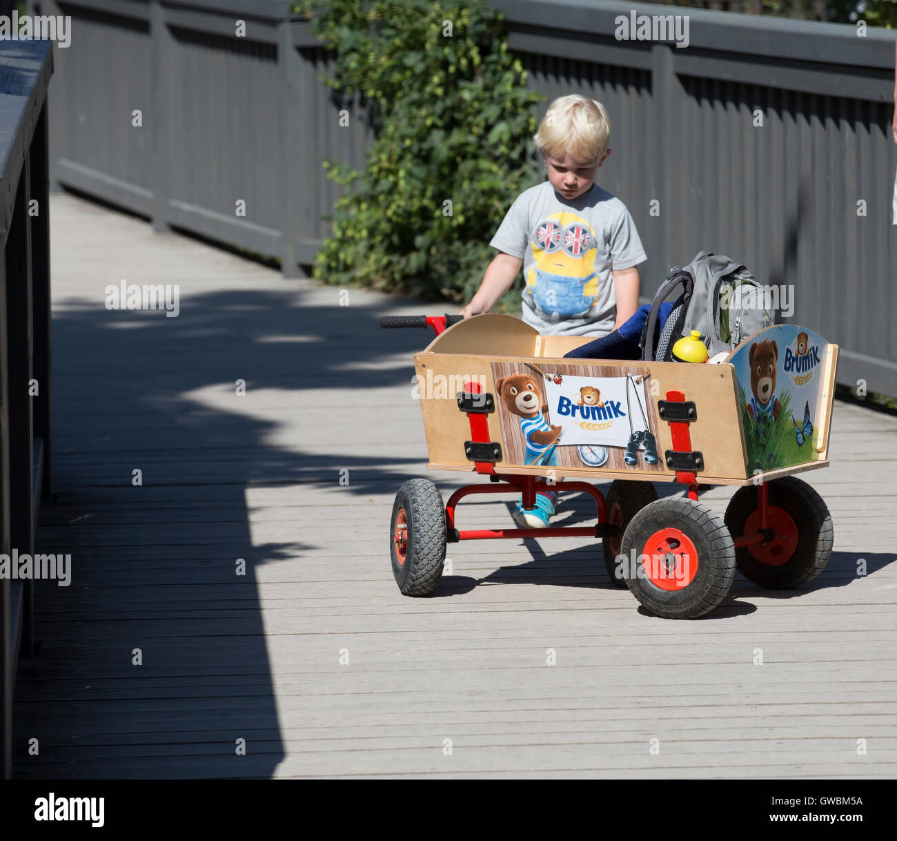 Young Child with a cart in Prague Zoo which is the fourth largest zoo ...