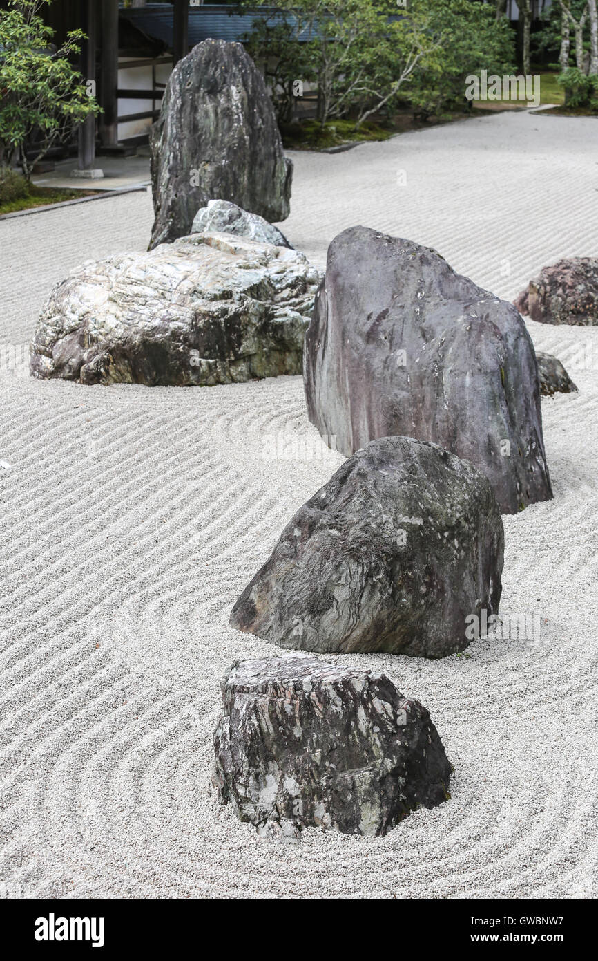 Stones in a Japanese Zen Garden with White Sand and Moss Stock Photo ...