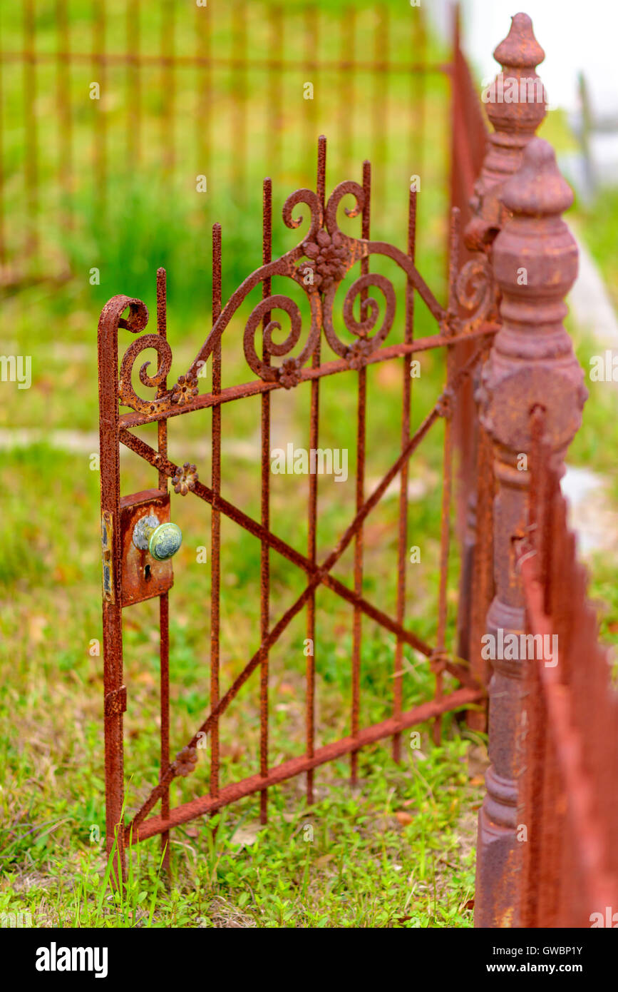 Old rusted gate located in the historic Cedar Rest Cemetery in Bay St ...