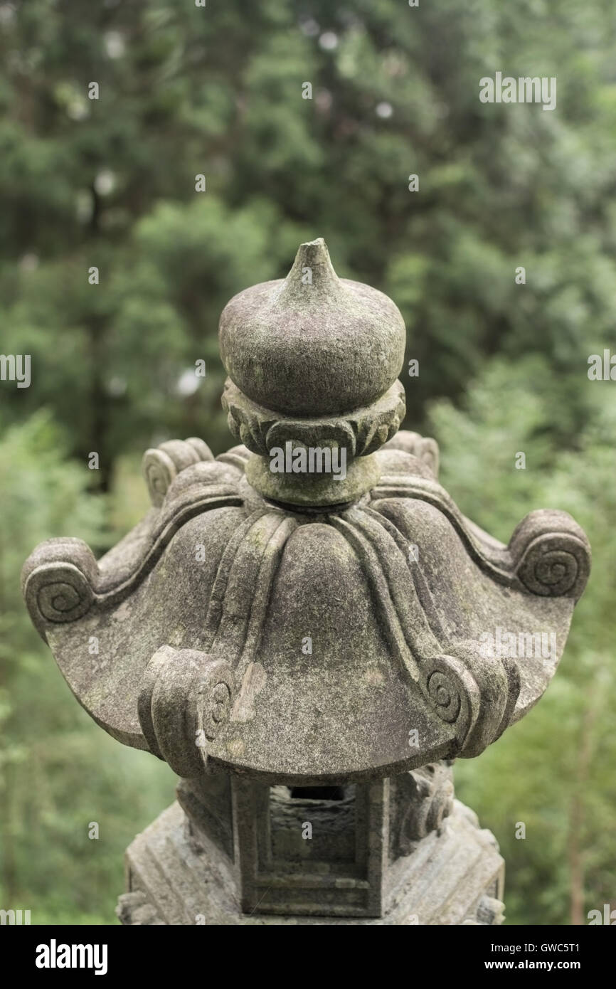 Traditional asian stone lantern Stock Photo - Alamy