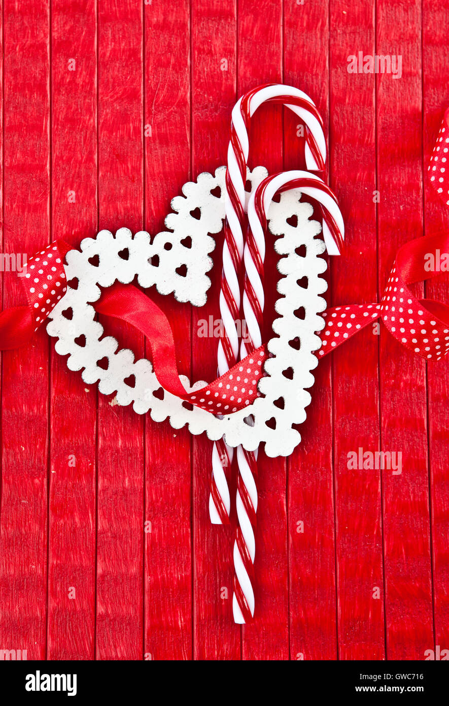Red background with candy canes Stock Photo - Alamy