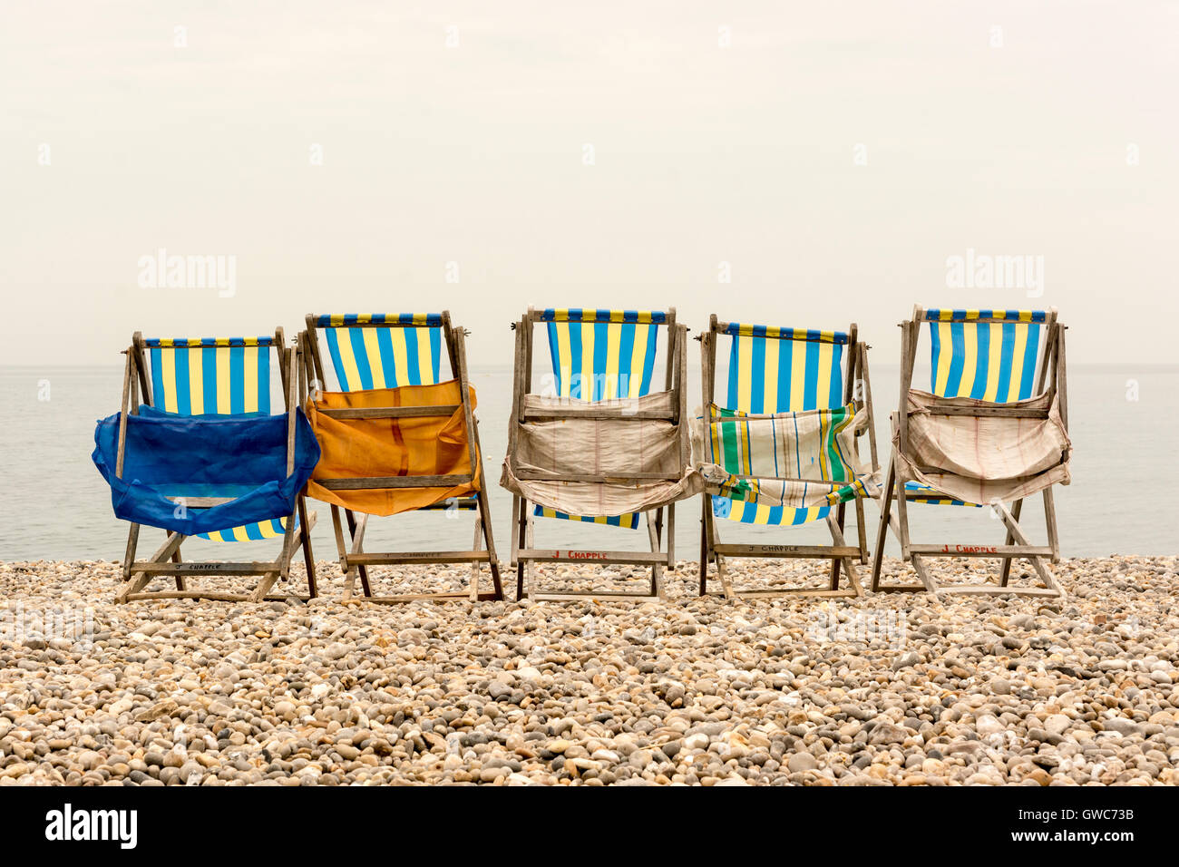 Empty deck chairs on Beer beach, Devon, south west England Stock Photo ...