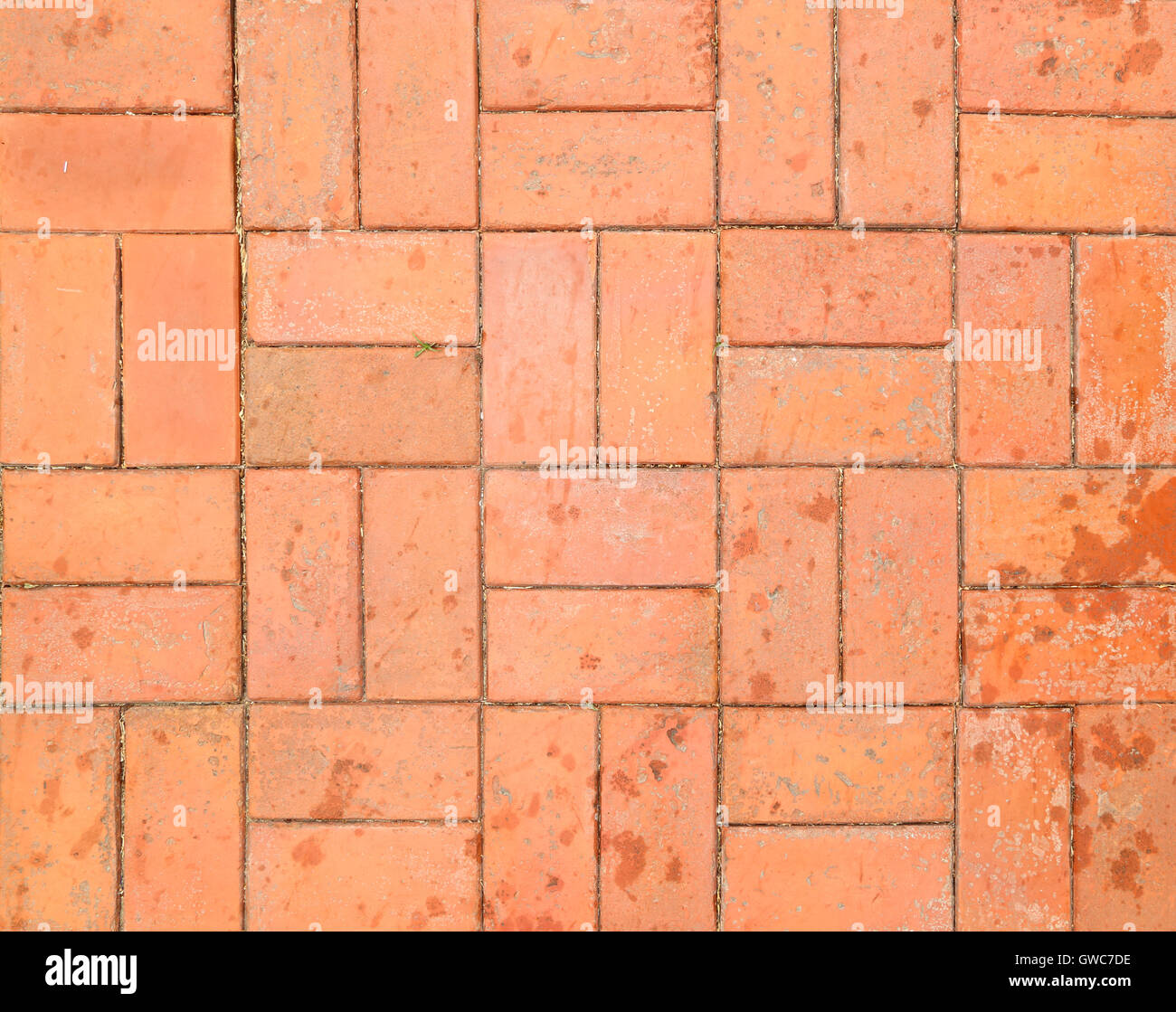 Red brick paving stones on a sidewalk Stock Photo - Alamy
