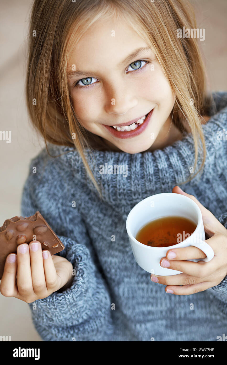 Child drinking tea Stock Photo - Alamy