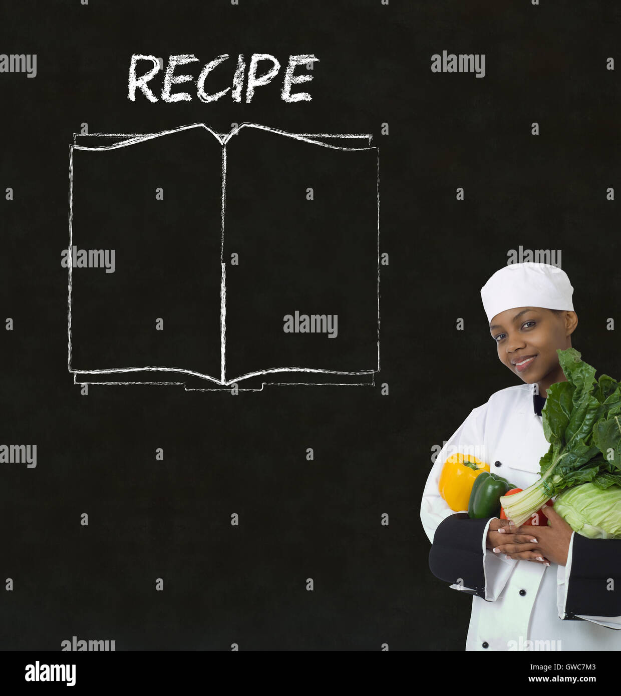 Chef with recipe book on chalk blackboard menu background Stock Photo ...
