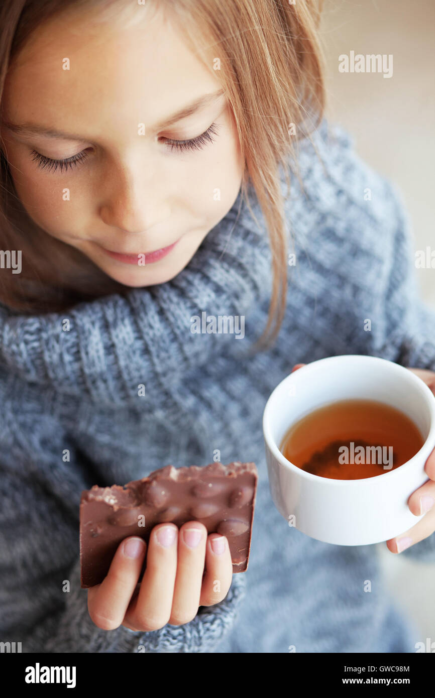 Child drinking tea Stock Photo - Alamy