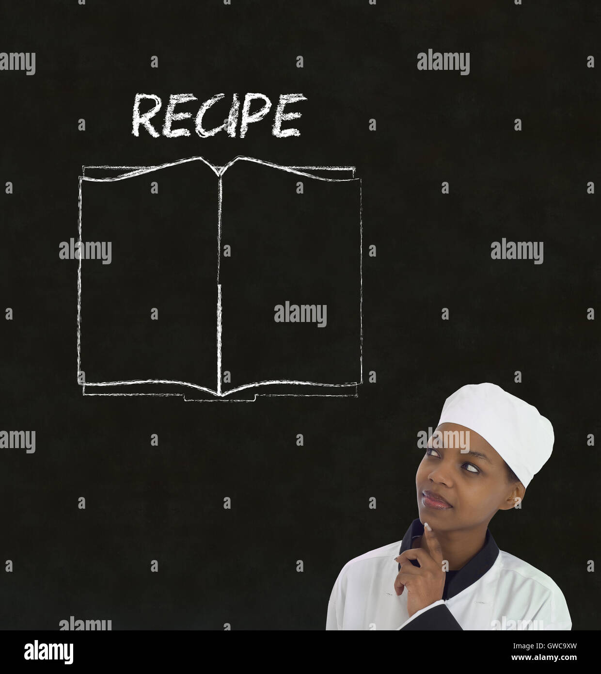 Chef with recipe book on chalk blackboard menu background Stock Photo ...