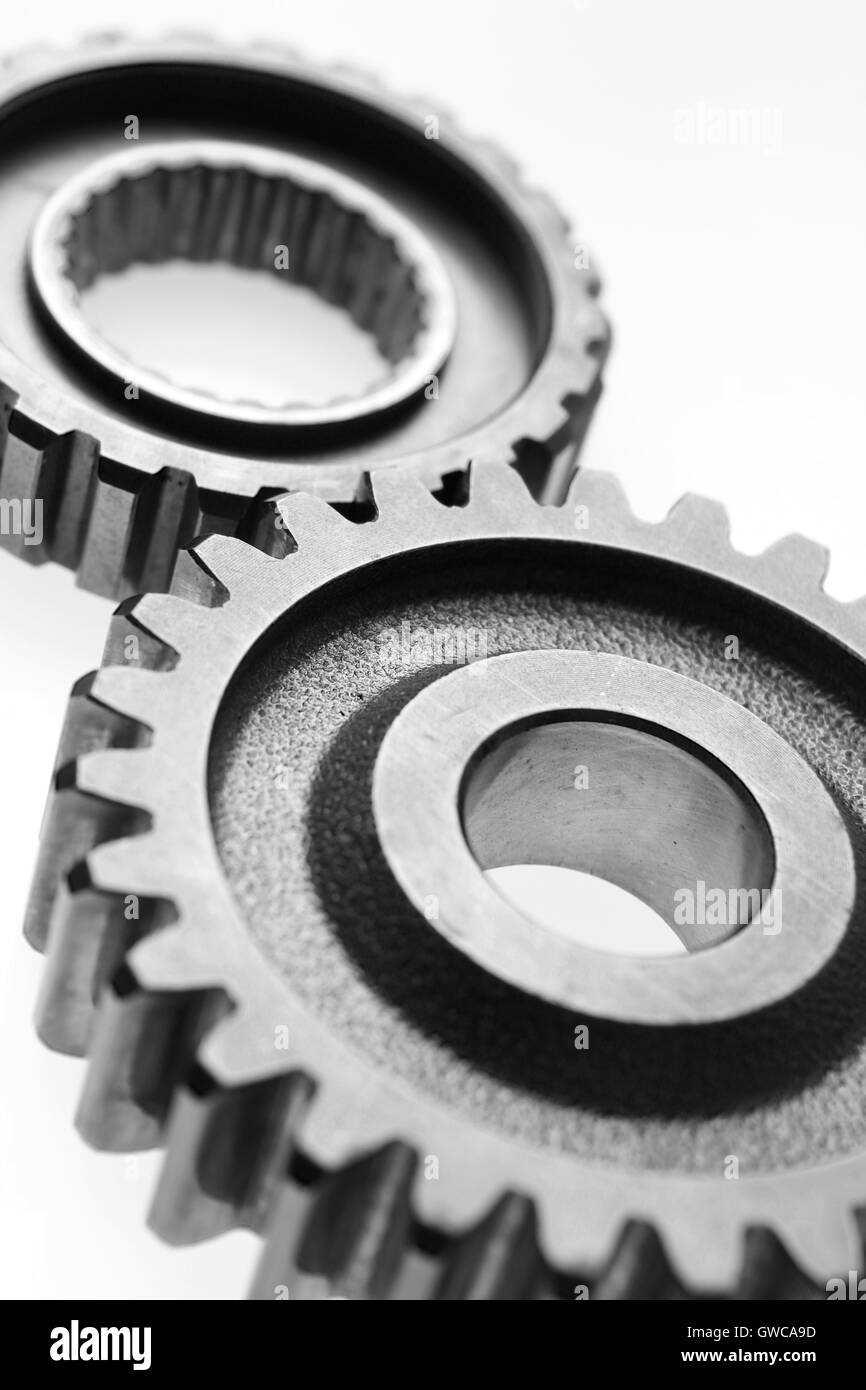 Closeup of two metal cog gears Stock Photo - Alamy