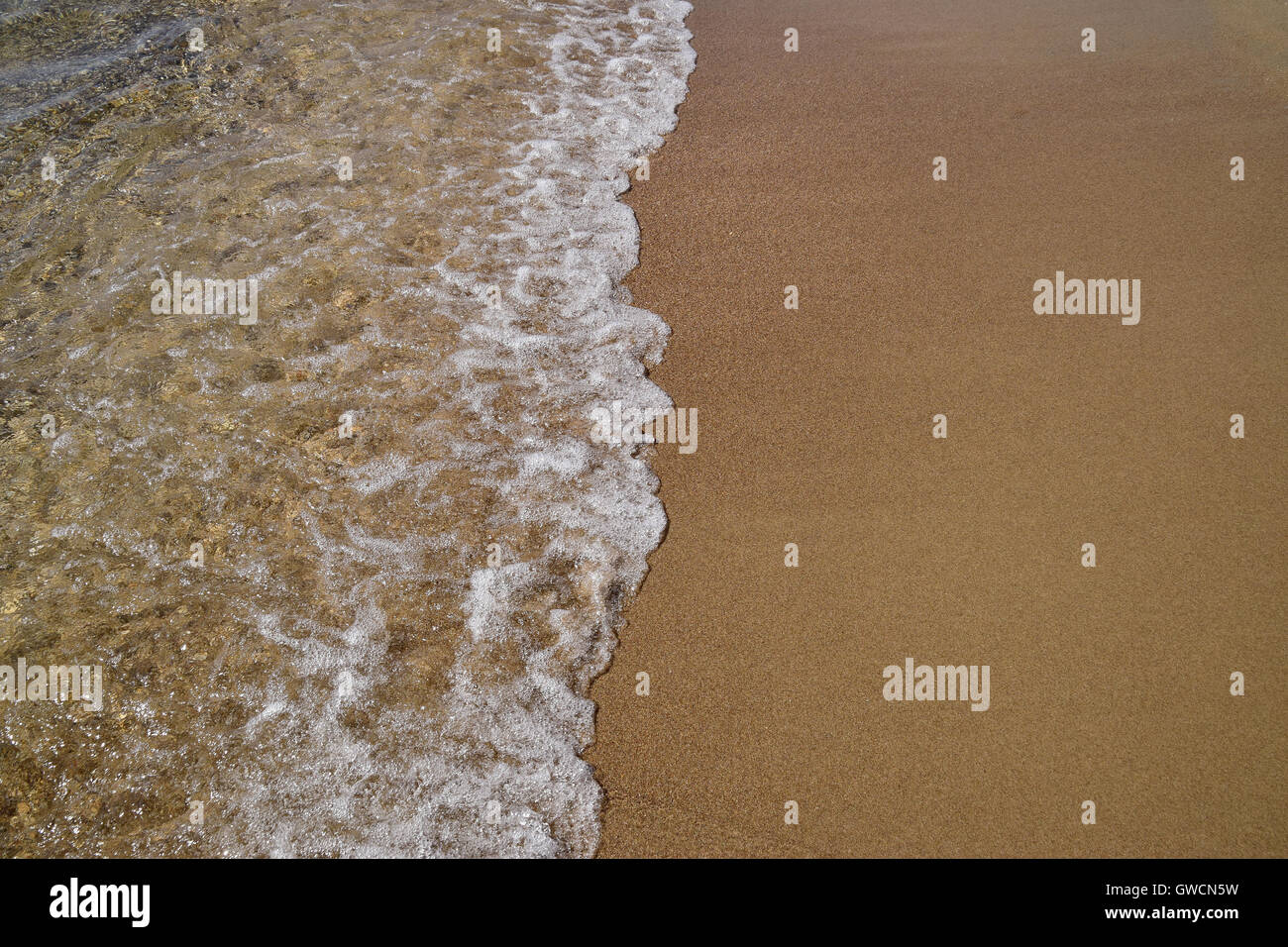 Gently lapping wave hi-res stock photography and images - Alamy