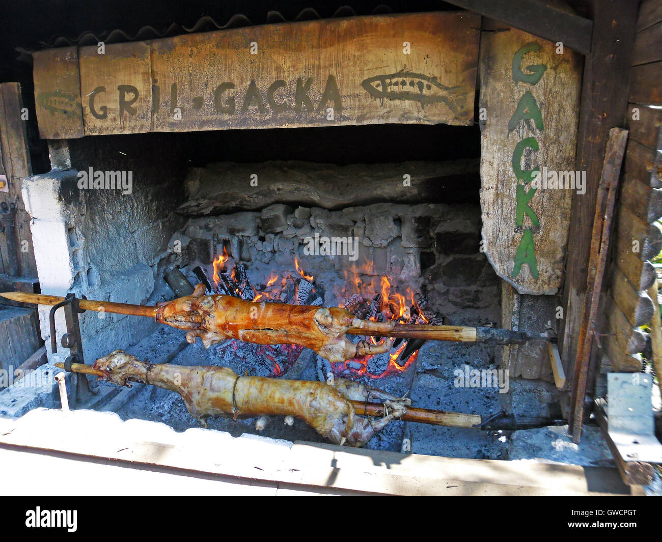 Gacko Polje,Lika,Croatia,pig and lamb on spit Stock Photo - Alamy