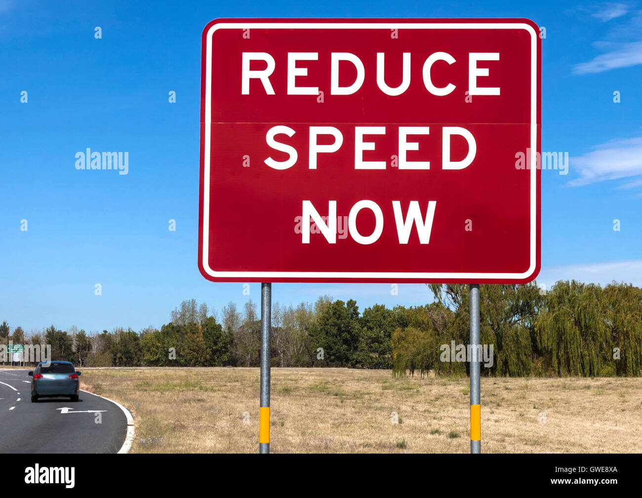 Road sign - Reduce Speed Now Stock Photo - Alamy Road sign - Reduce Speed Now Stock Photo - Alamy