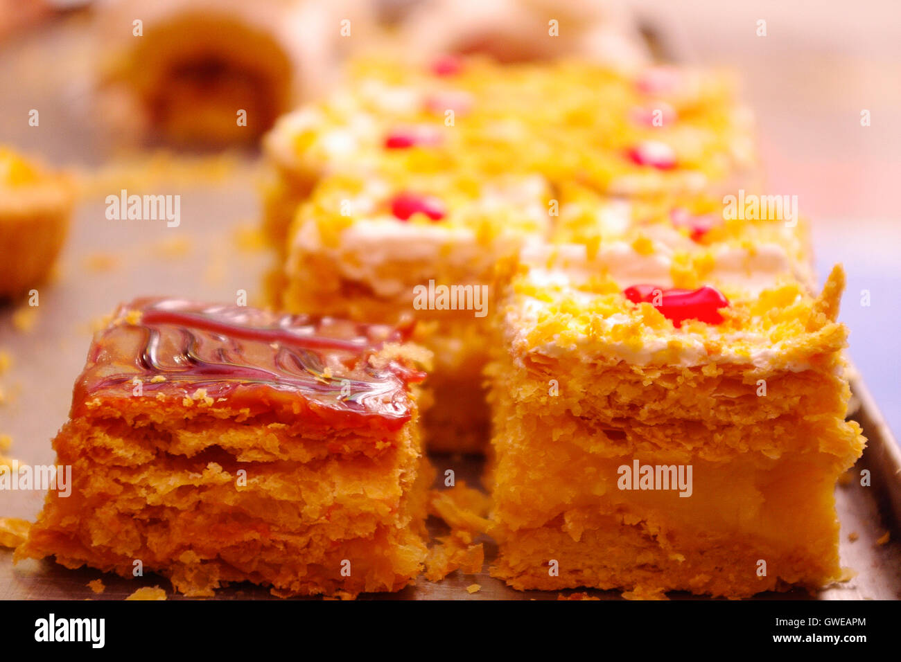 Two types of ecuadorian cakes, vanilla and manjar flavor. Both with ...