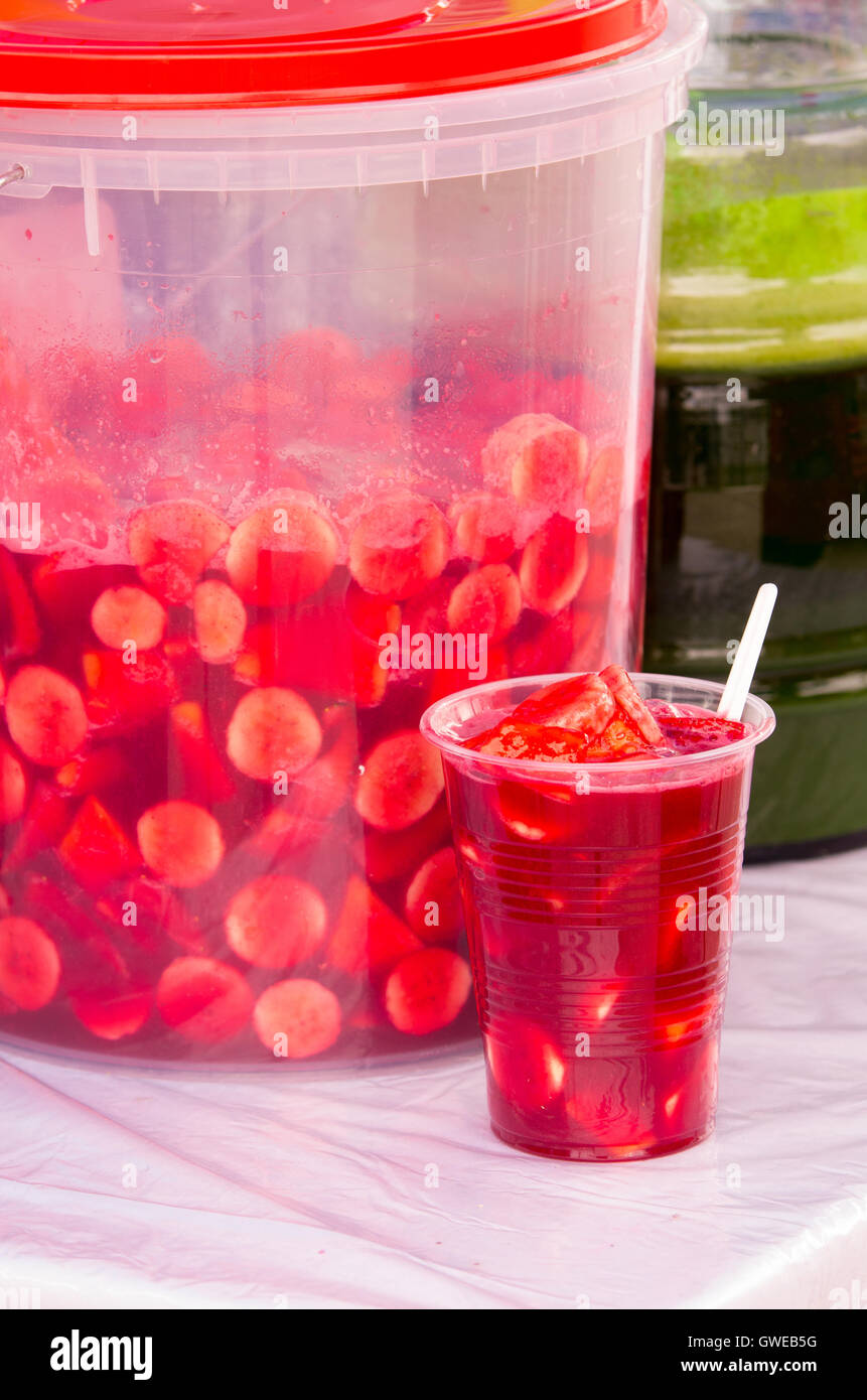 Fruits and juice ready to serve, bananas on plastic container. Sample ...