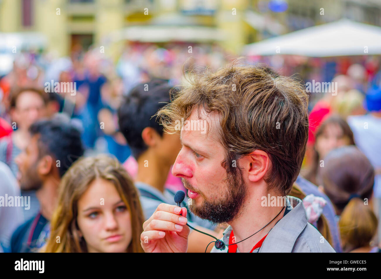 FLORENCE, ITALY - JUNE 12, 2015: Italian tour guide, microphone ...
