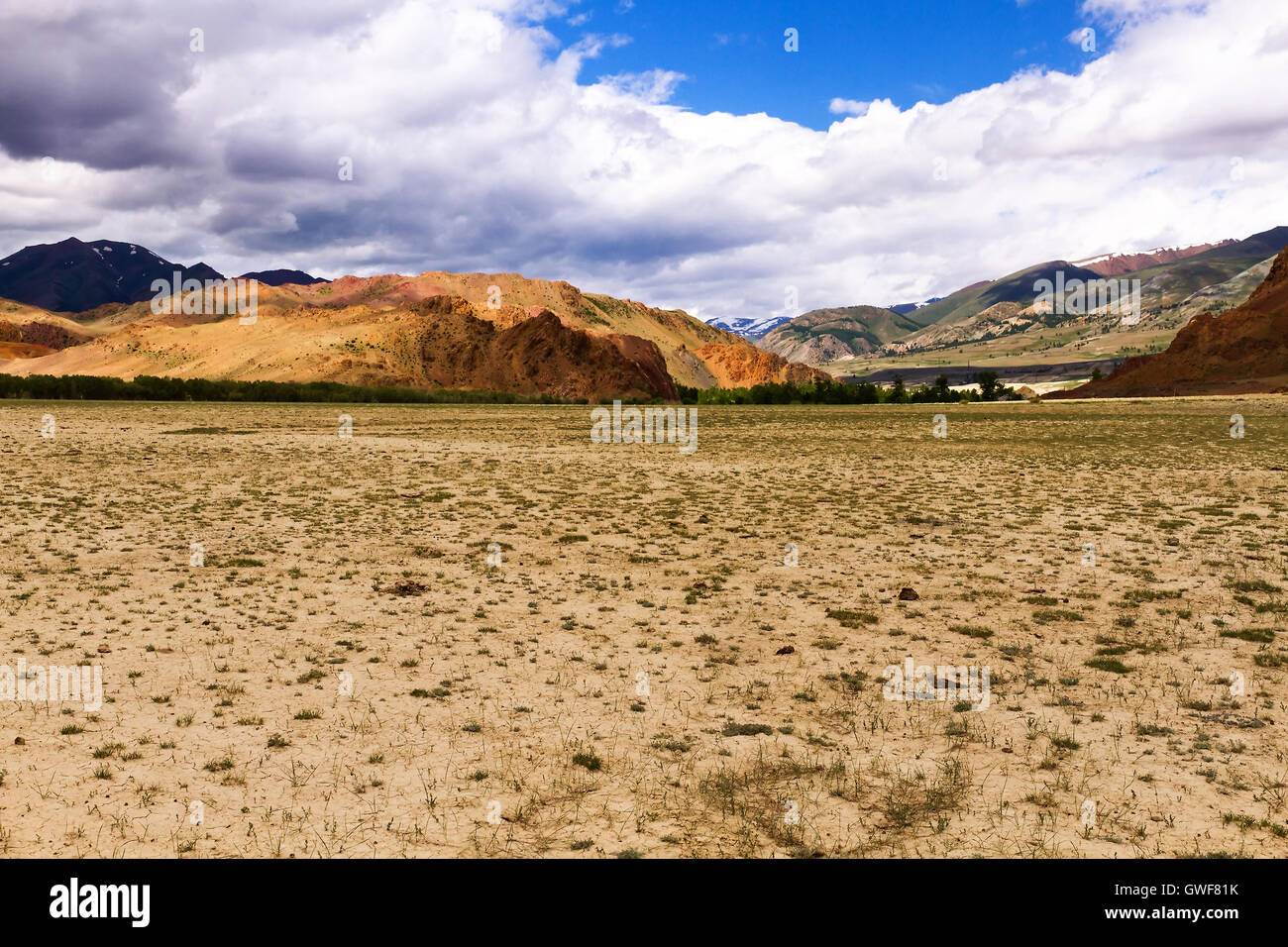 The Altai landscape with a steppe or semi desert, red mountains at ...