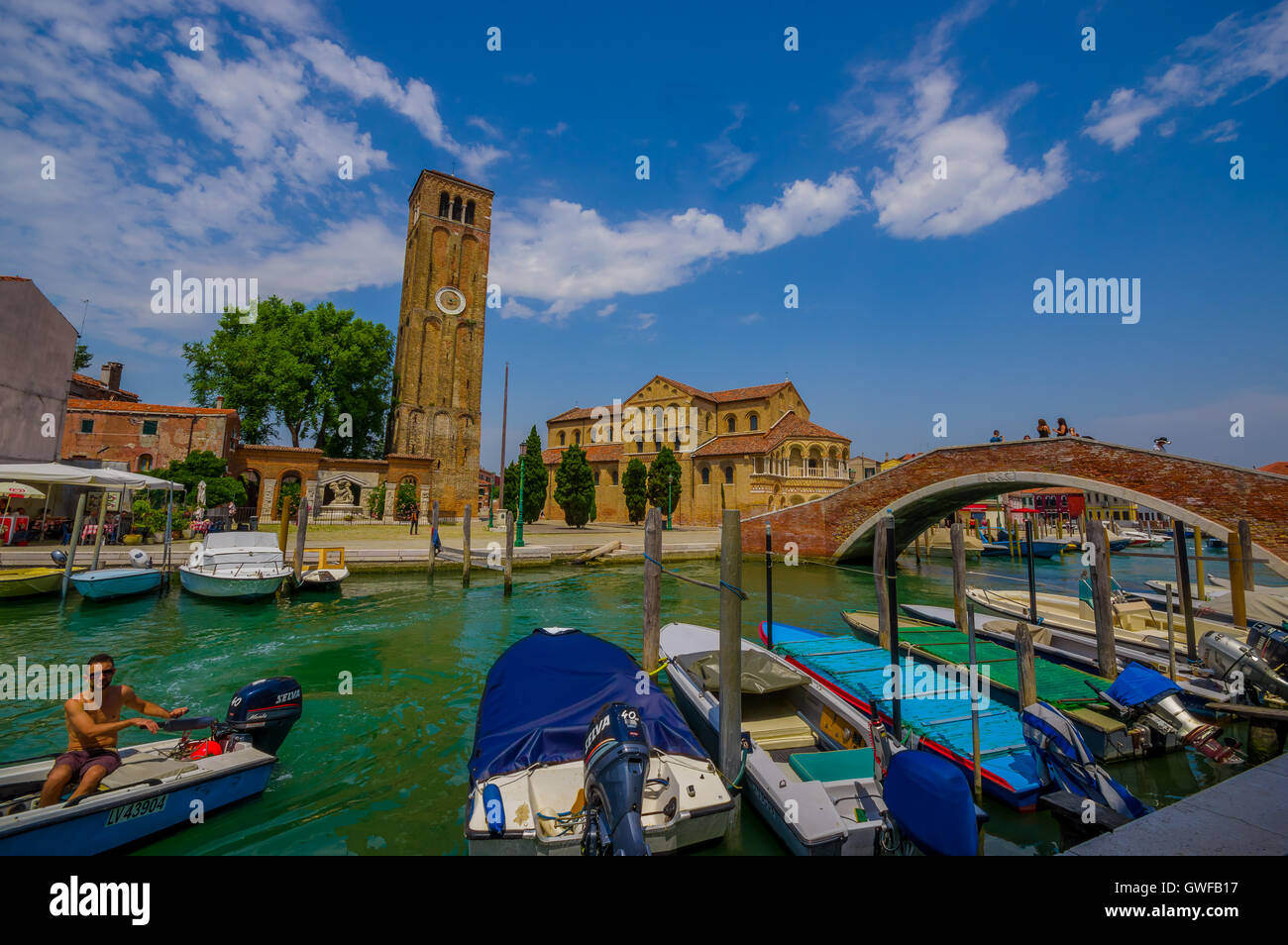MURANO, ITALY - JUNE 16, 2015: Murano's Cathedral and tower view from ...