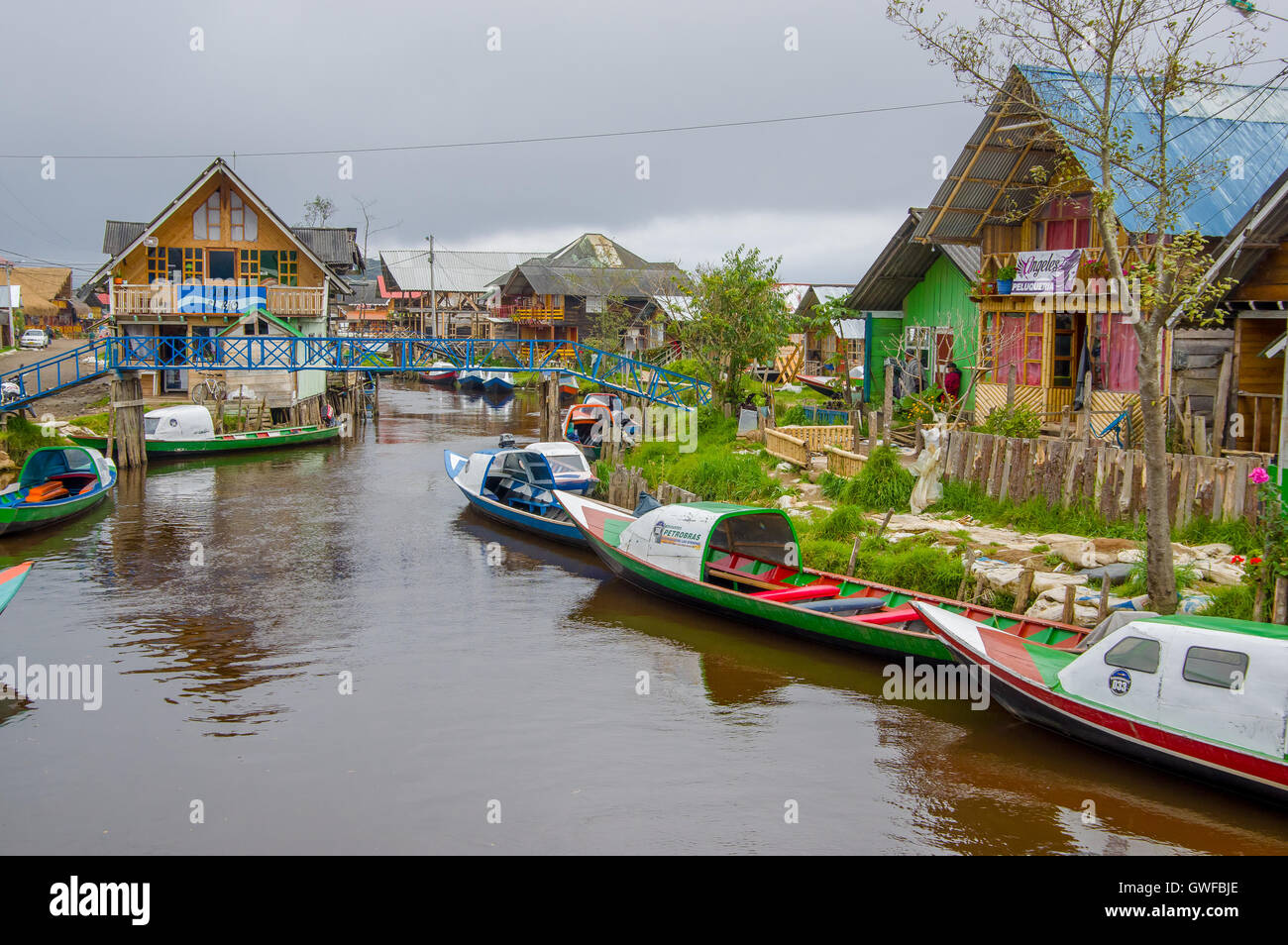 PASTO, COLOMBIA - JULY 3, 2016: some boats parked on the river close to ...