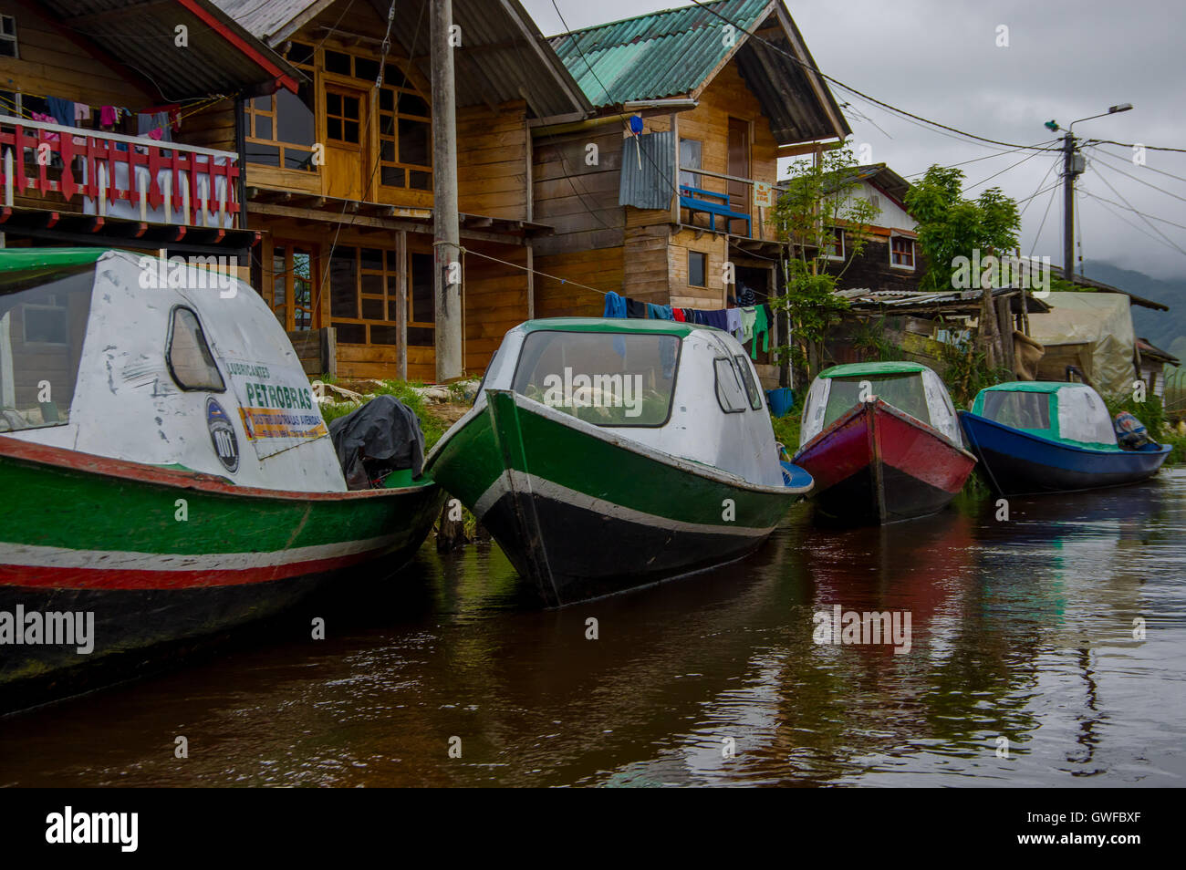 PASTO, COLOMBIA - JULY 3, 2016: some colorfull boats parked next to a ...
