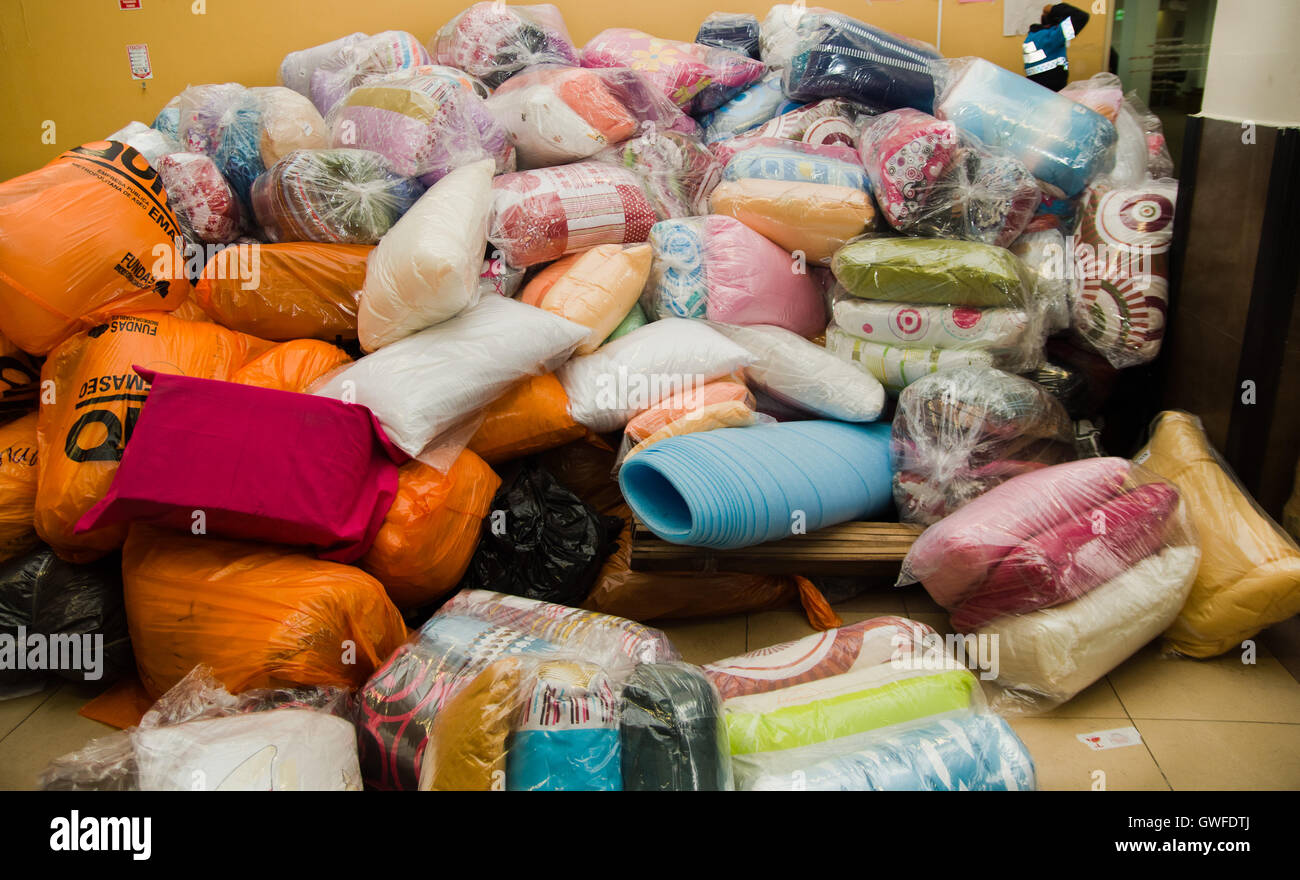 Quito, Ecuador - April 23, 2016: Disaster relief food, clothes ...