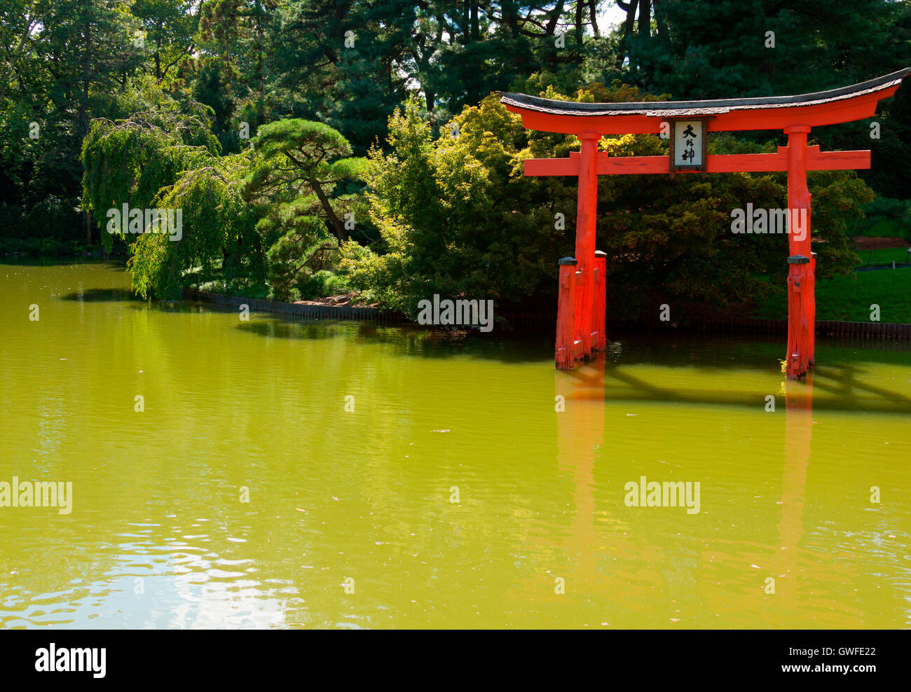 Japanese Garden and pond with a red Zen Tower Stock Photo - Alamy