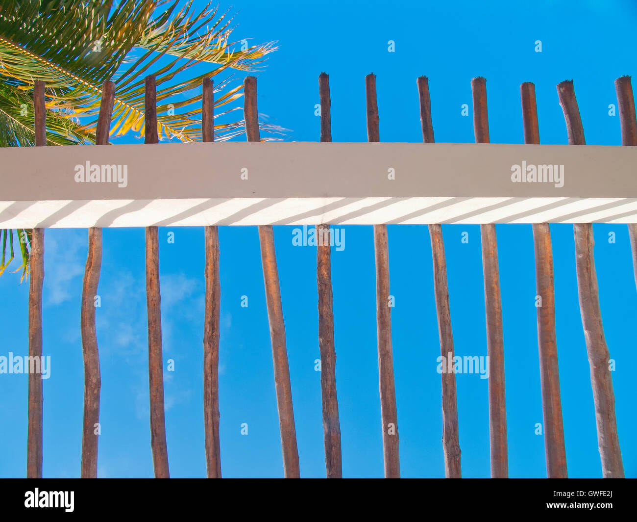 Tropical resort fence agains the blue caribbean sky Stock Photo - Alamy