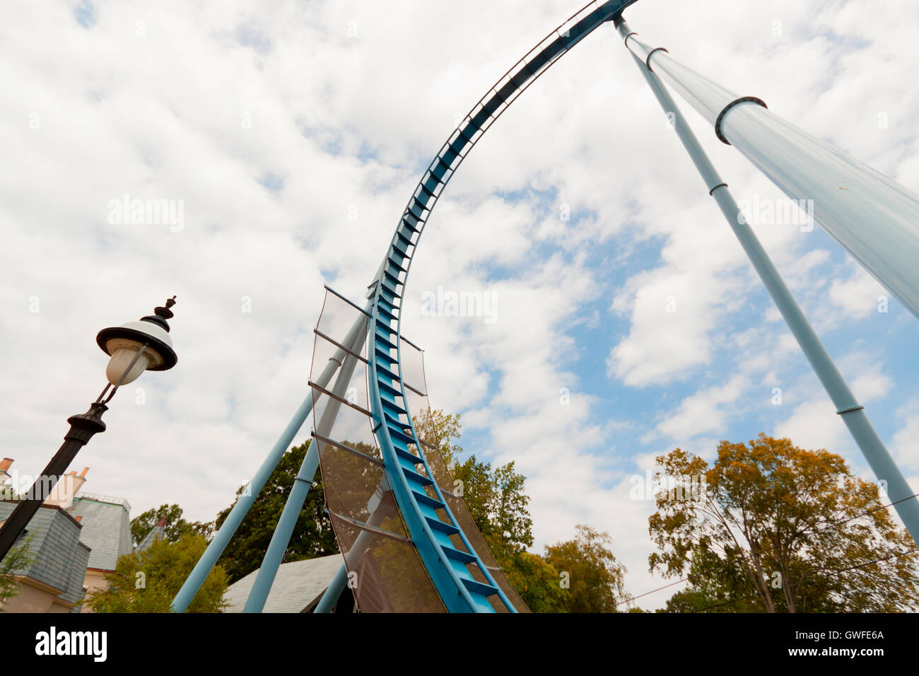 Steel loops of the extreme rollercoaster ride in the amusement park ...
