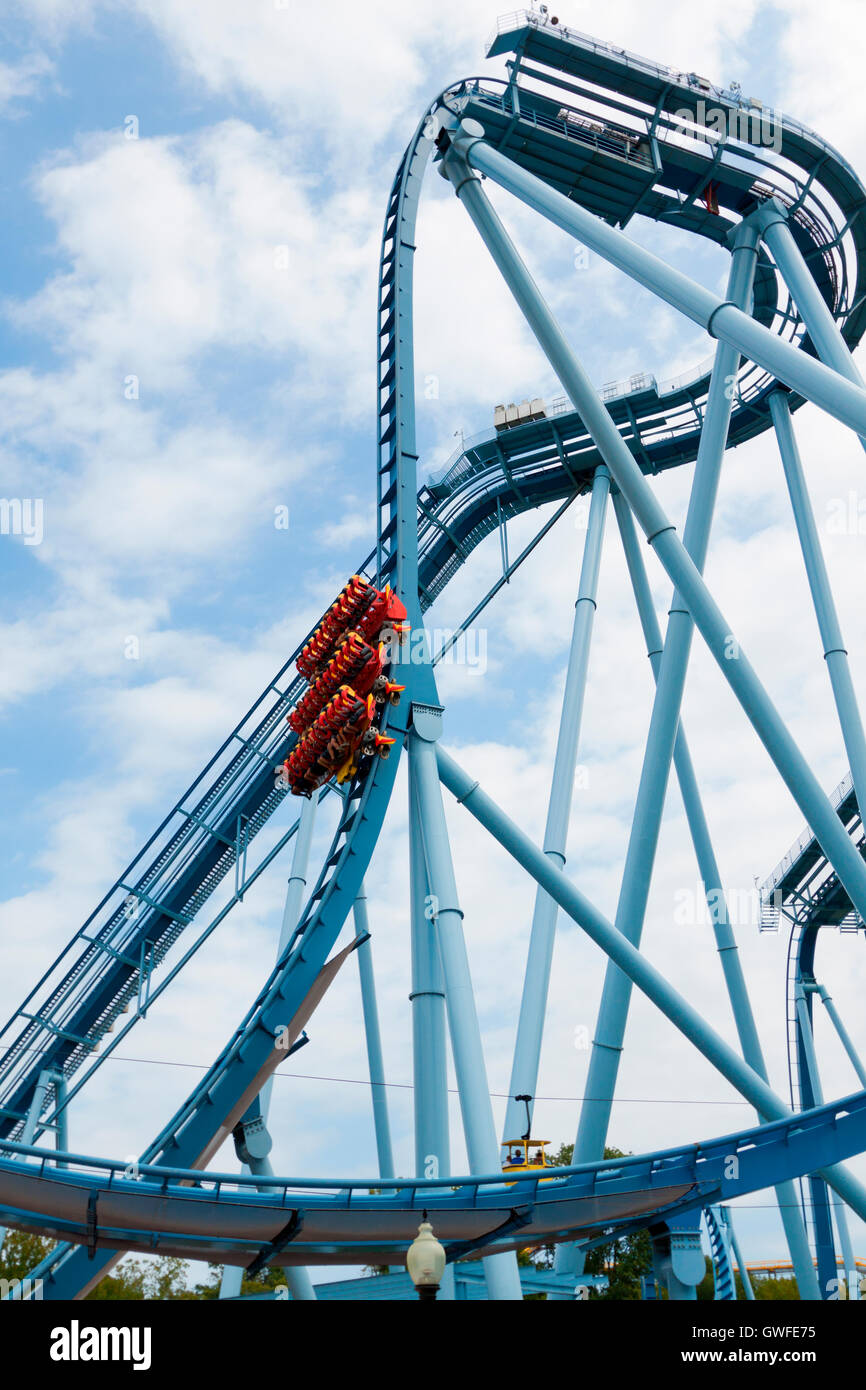Steel loops of the extreme rollercoaster ride in the amusement park ...