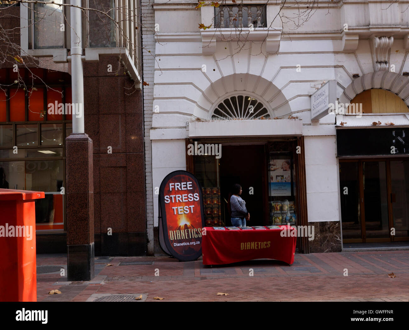 Woman with information about Dianetics in front of The Church of ...