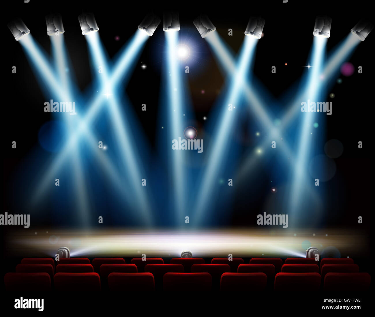 A theater or theatre stage and with footlights and spotlights and red ...