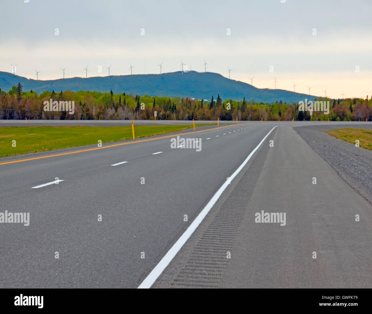 View of the Trans-Canadian Highway with electric wind mill towers in ...