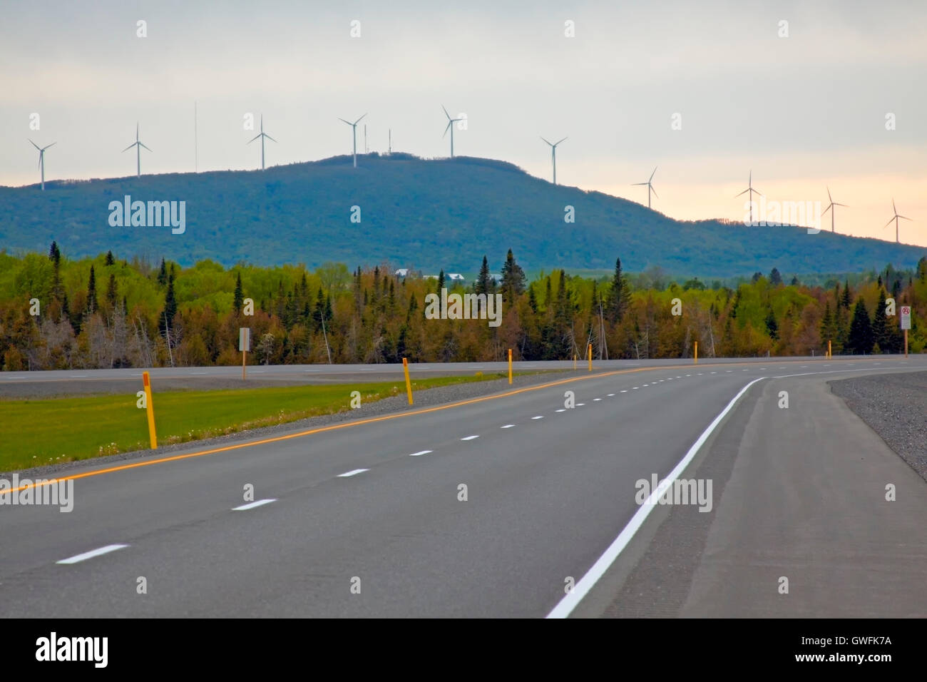 View of the Trans-Canadian Highway with electric wind mill towers in ...
