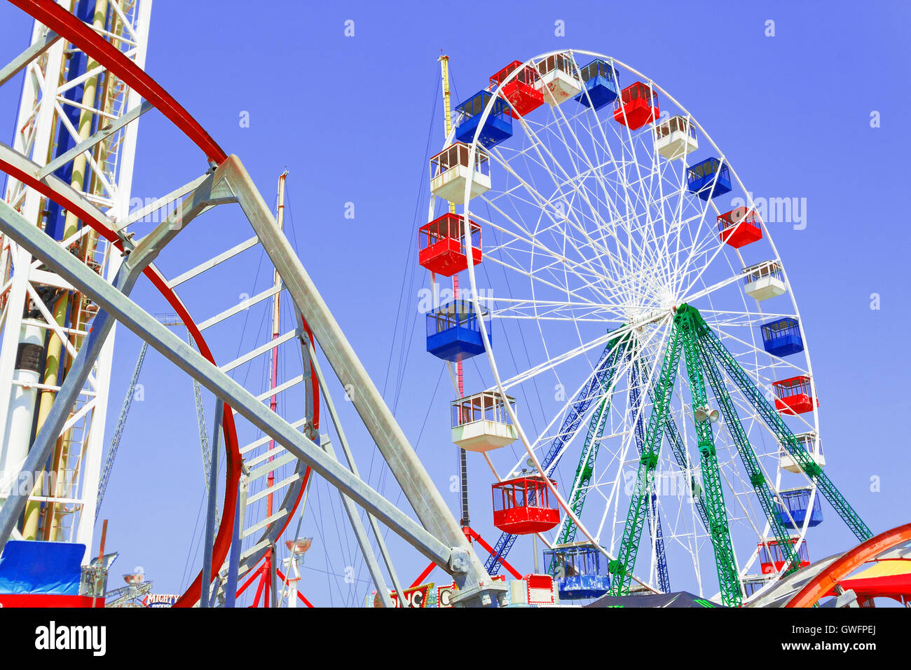 Colorful amusement park ride Stock Photo - Alamy