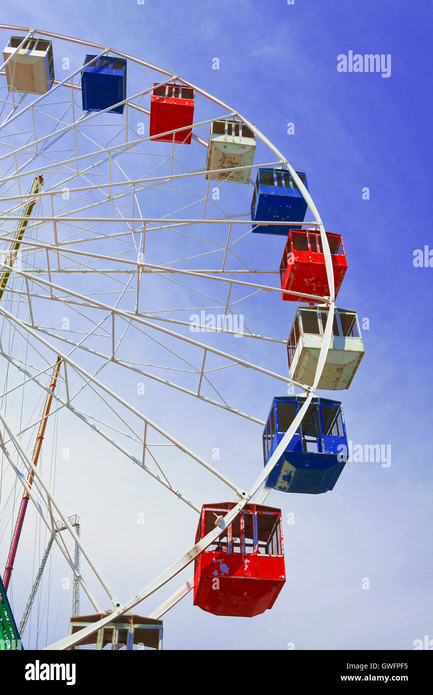 Colorful amusement park ride Stock Photo - Alamy