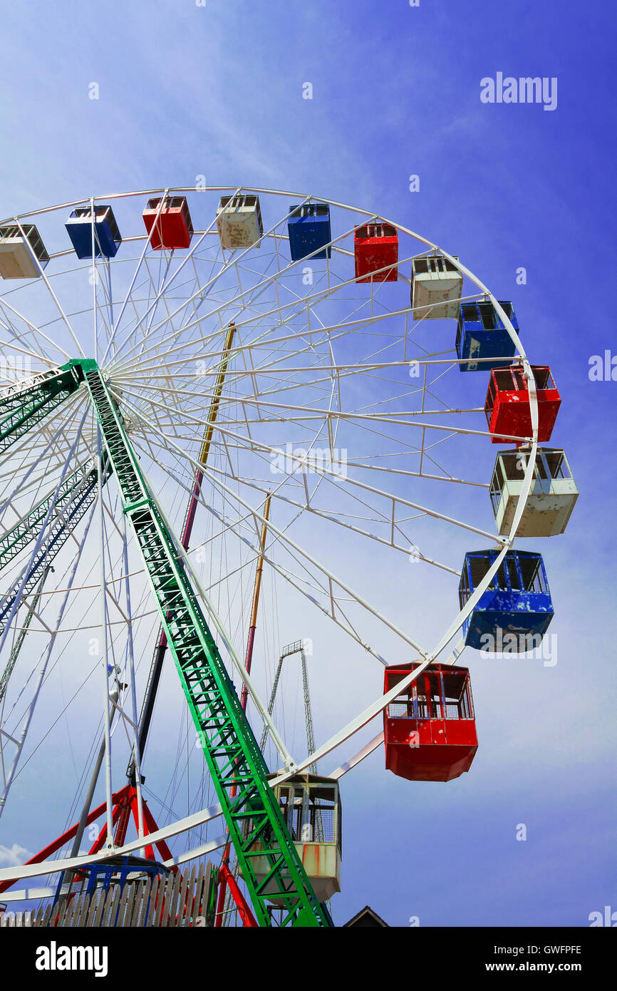 Colorful amusement park ride Stock Photo - Alamy