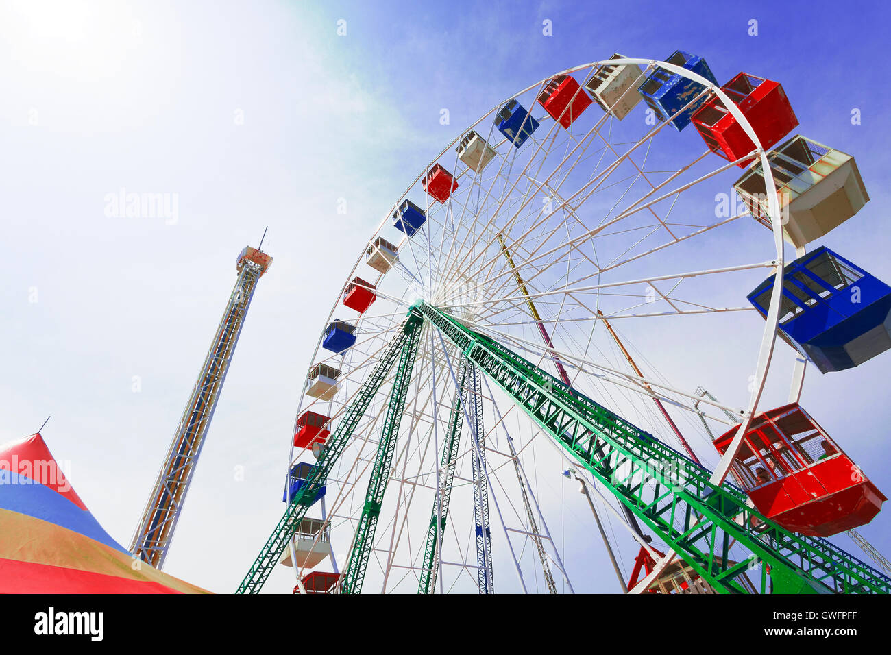 Colorful amusement park ride Stock Photo - Alamy