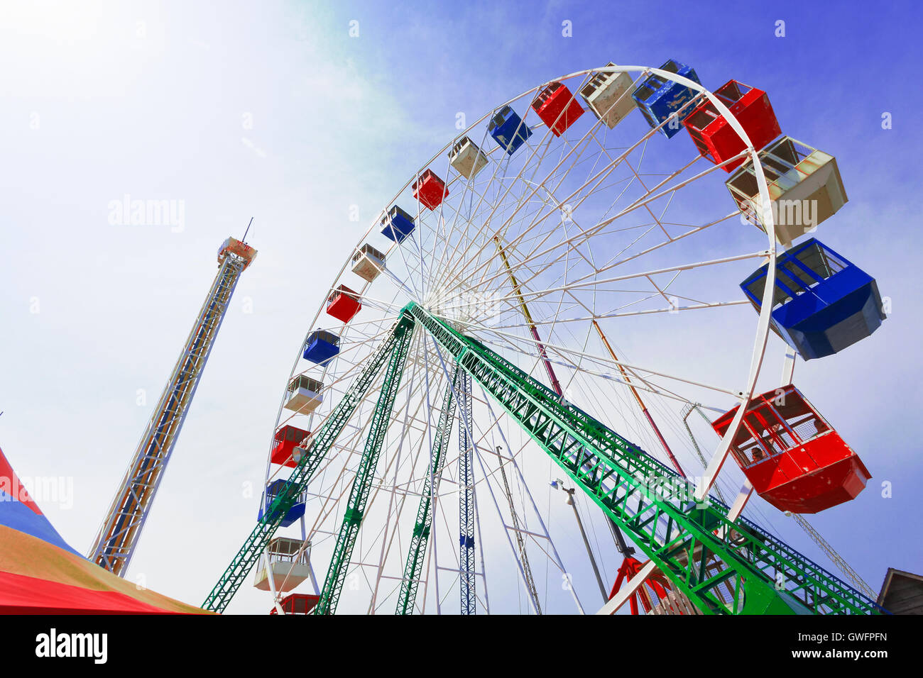 Colorful amusement park ride Stock Photo - Alamy