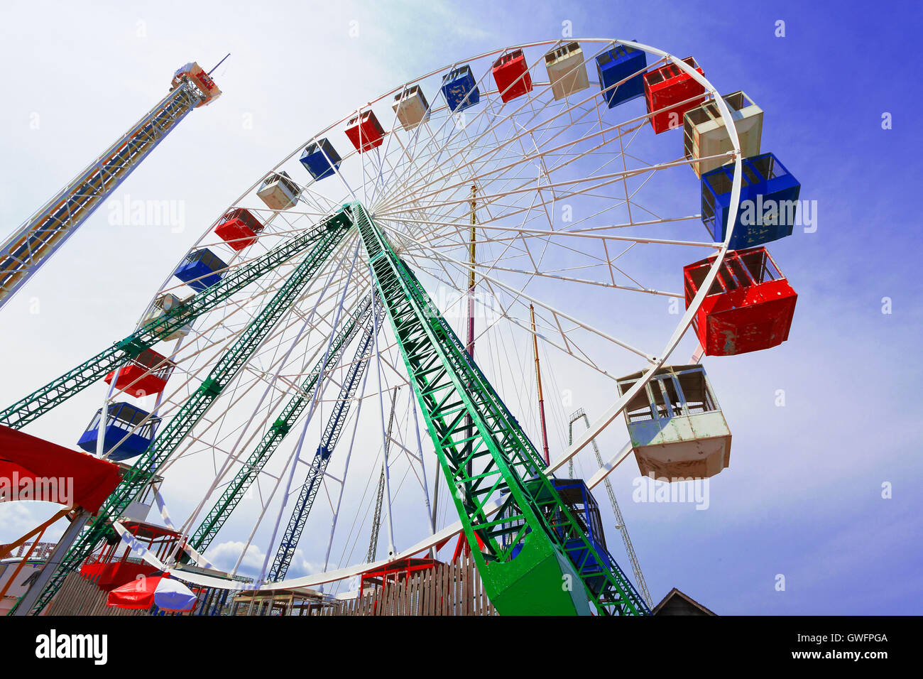 Colorful amusement park ride Stock Photo - Alamy