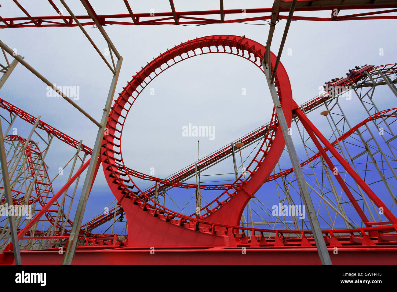 Colorful amusement park ride Stock Photo - Alamy