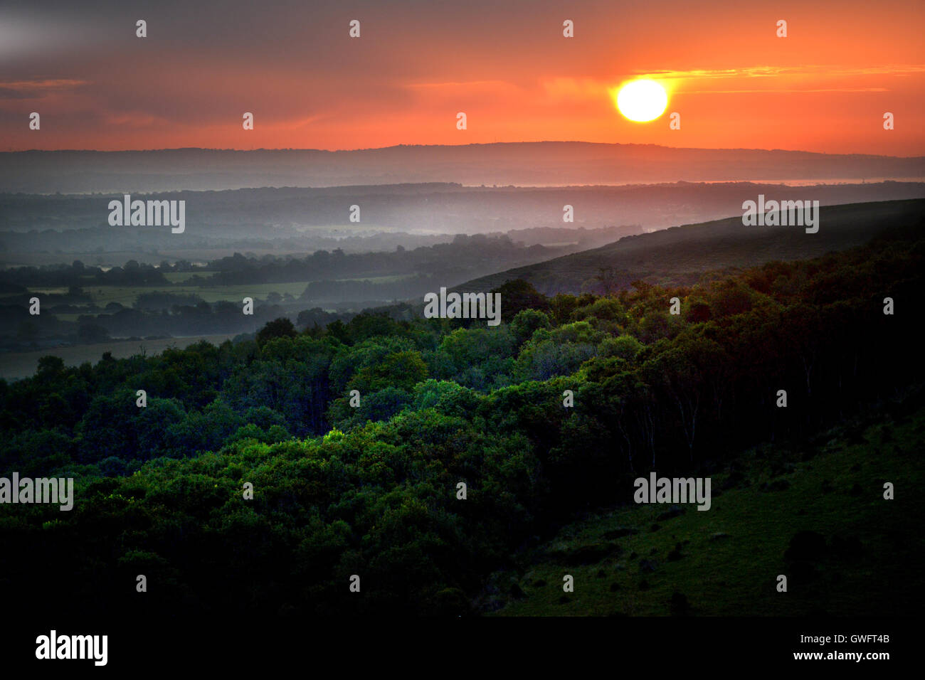 Rising sun over hills hi-res stock photography and images - Alamy