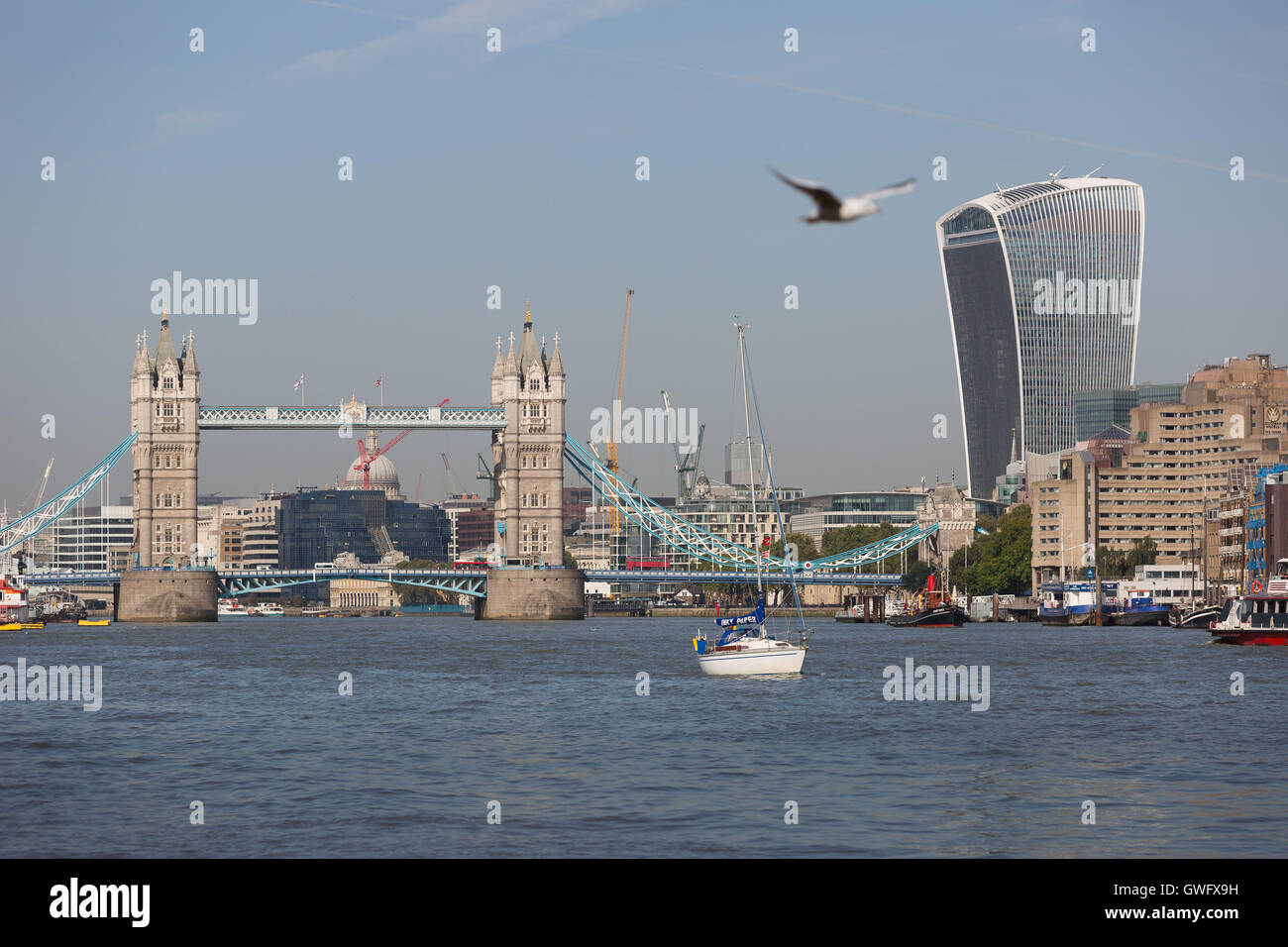 London, UK. 13th September, 2016. A small sailing boat passes in front ...