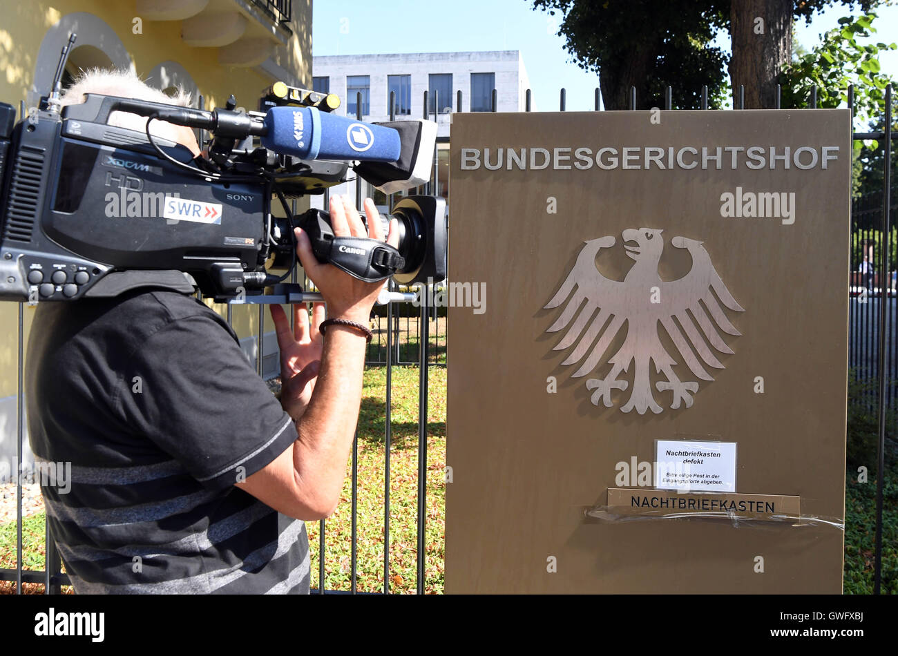 Karlsruhe, Germany. 13th September, 2016. A camera man filming a sign ...