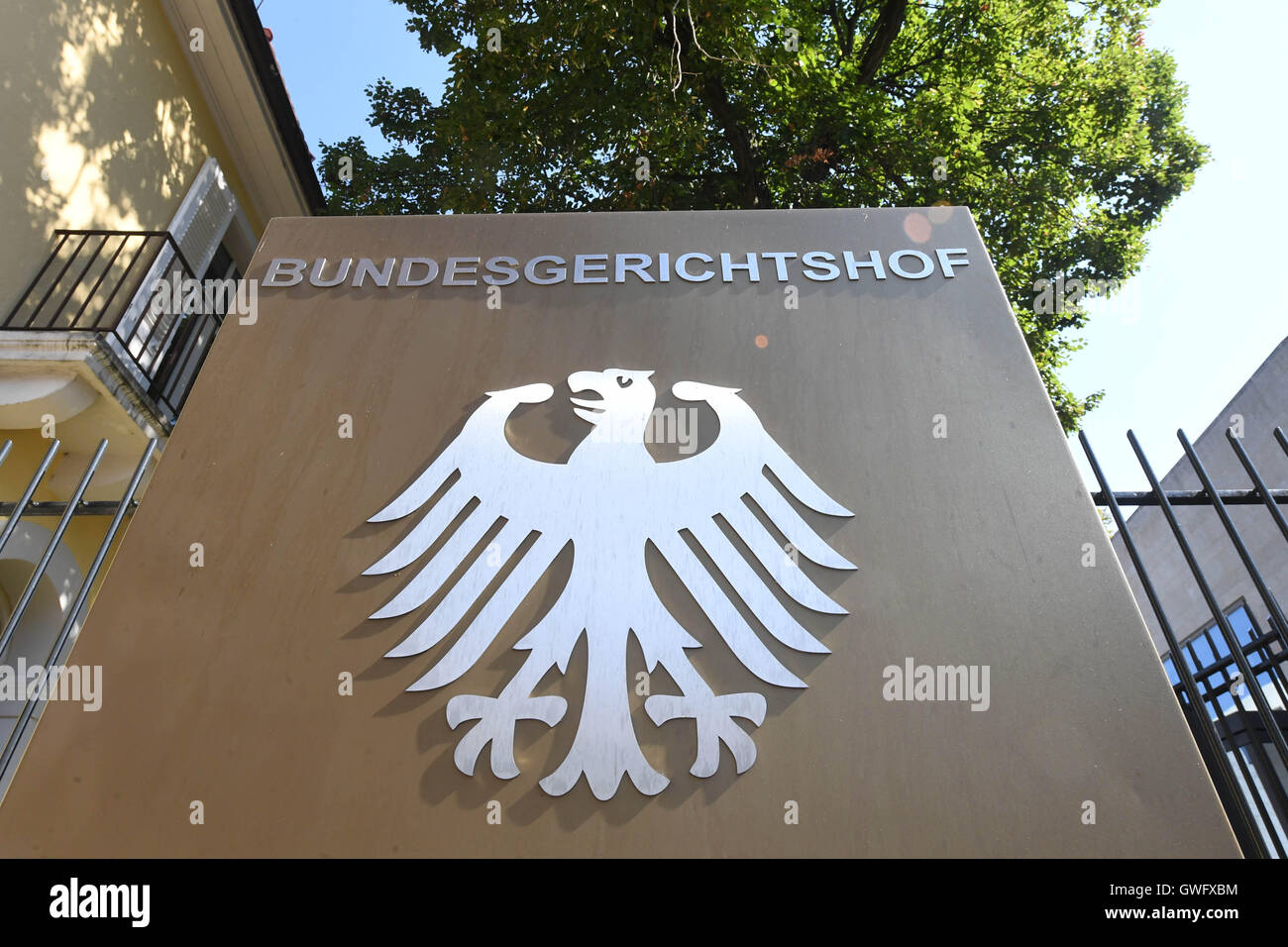Karlsruhe, Germany. 13th Sep, 2016. A sign featuring hte German eagle ...