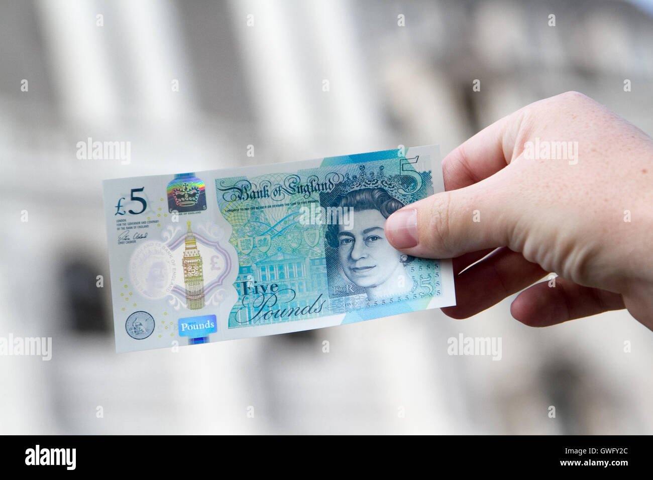 London UK. 13th September 2016. The new polymer five pound note with ...