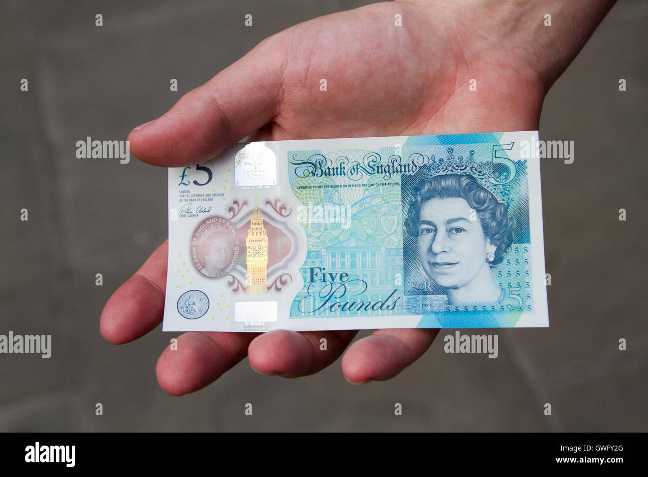 London UK. 13th September 2016. The new polymer five pound note with ...
