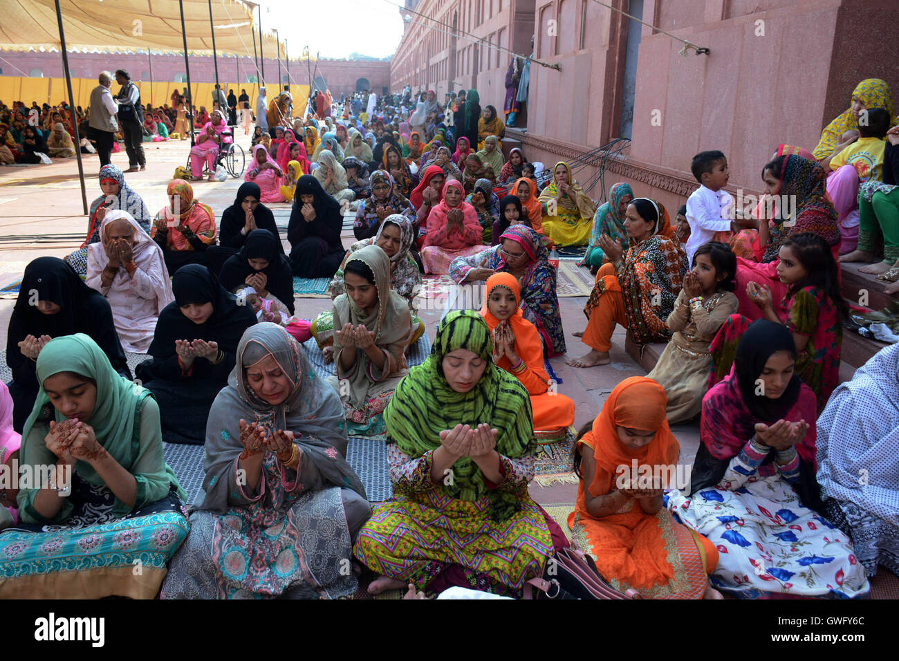 Lahore. 13th Sep, 2016. Muslim women offer Eid al-Adha prayers at a ...