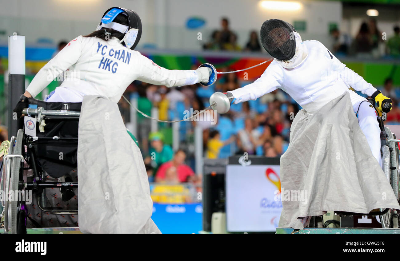 Simone Briese-Baetke (R) of Germany competes in wheelchair fencing ...